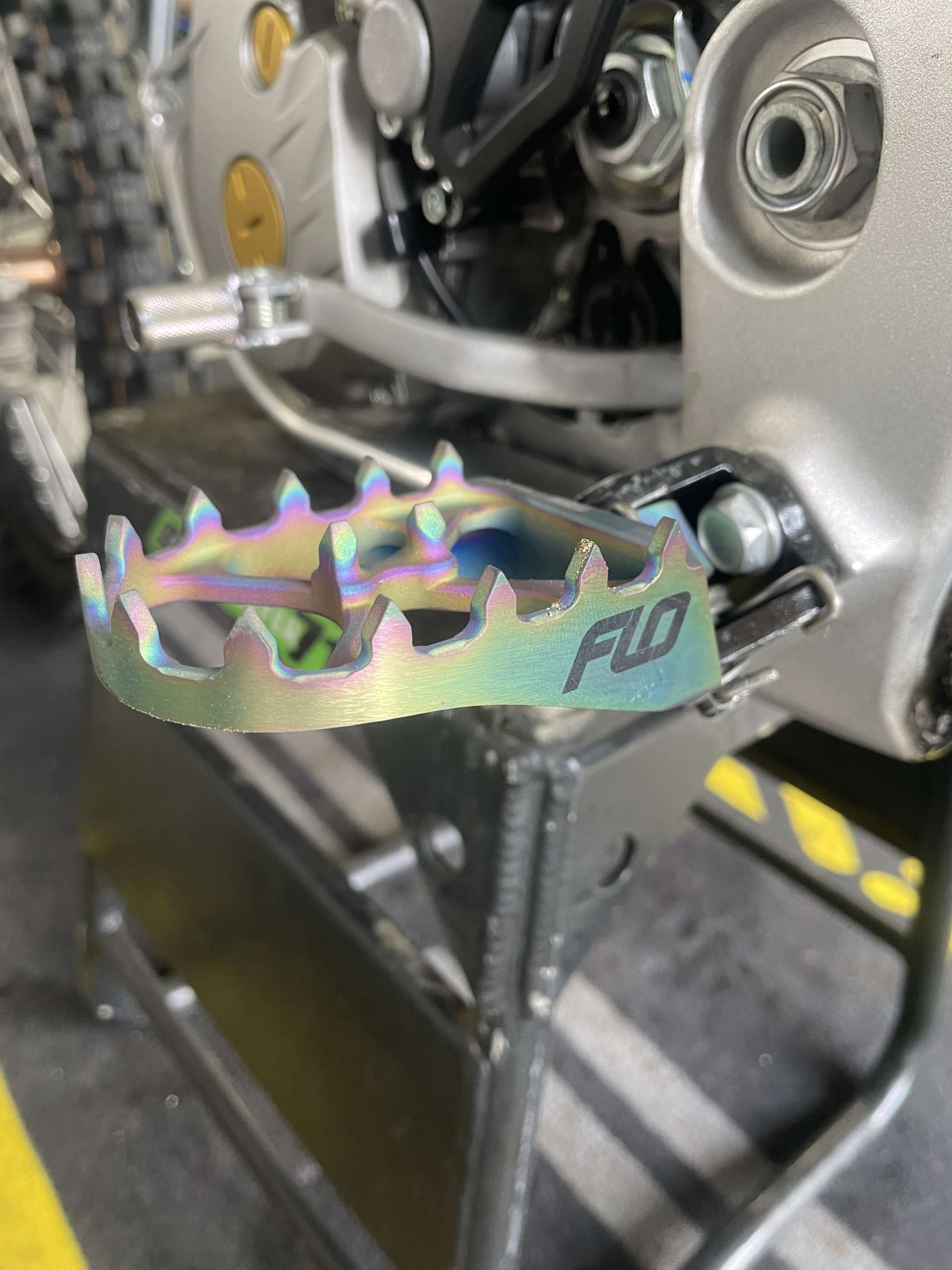 Flo Titanium Footpegs – Keefer, Inc. Tested